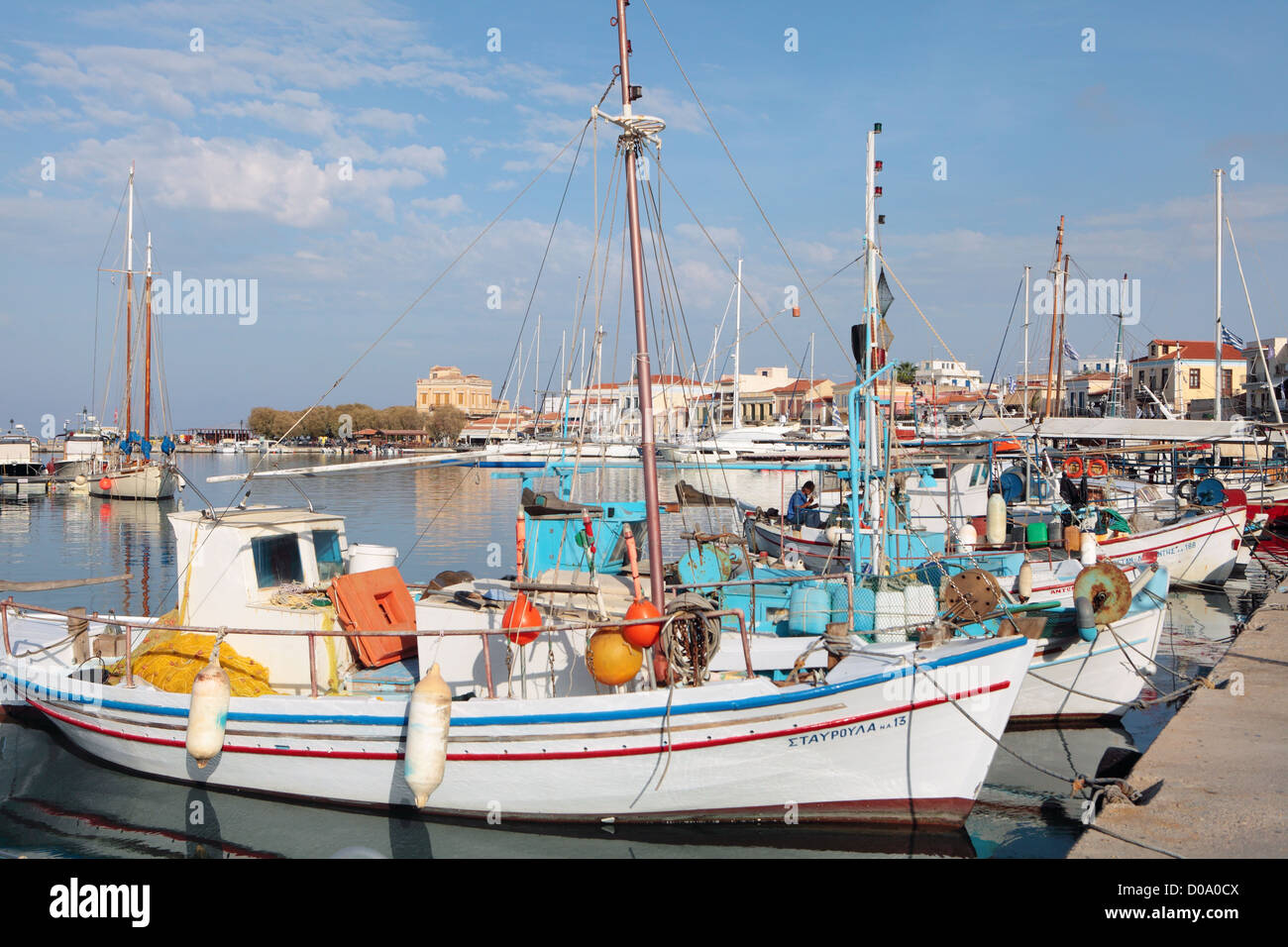 Small greek fishing boats, or caiques, tied up in the harbour at Aegina ...
