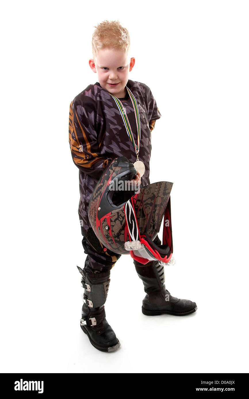 Young motor race boy is posing over white background Stock Photo - Alamy