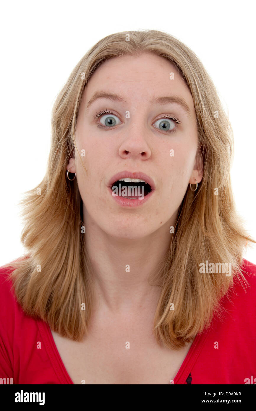Young woman is looking surprised isolated on white background Stock ...