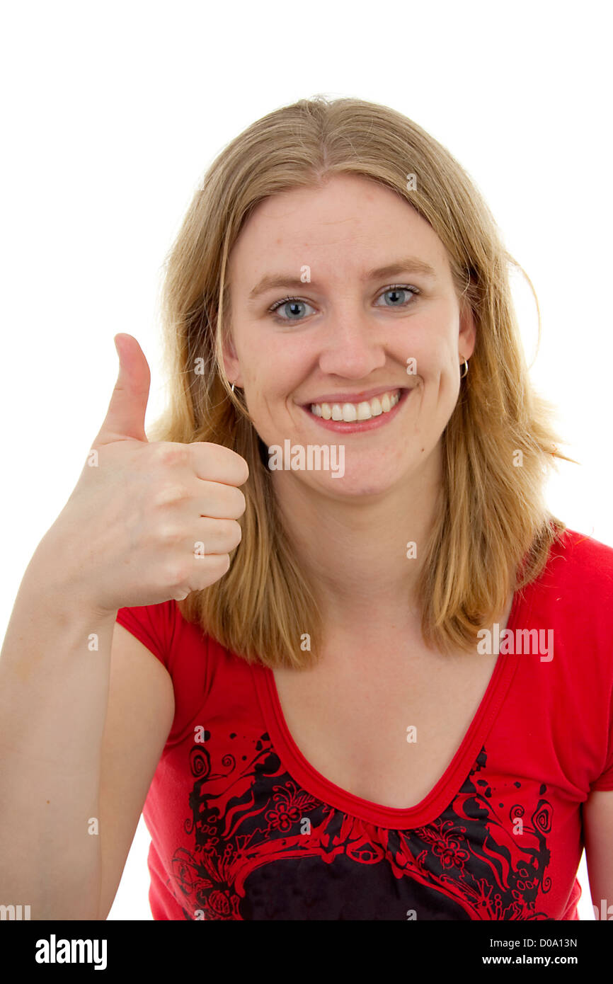 Young woman with thumbs up over white background Stock Photo - Alamy