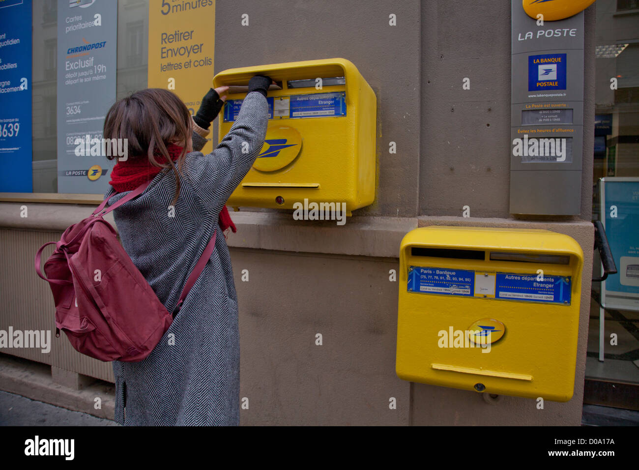 Woman posting letter in post hi-res stock photography and images - Alamy