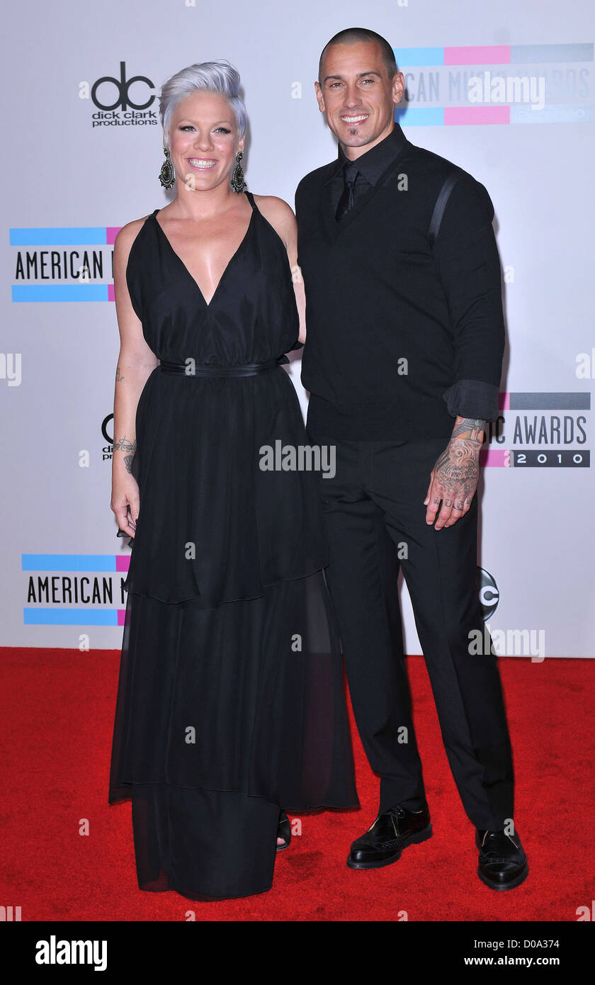 Singer Pink, real name Alecia Moore and husband Carey Hart 2010 ...