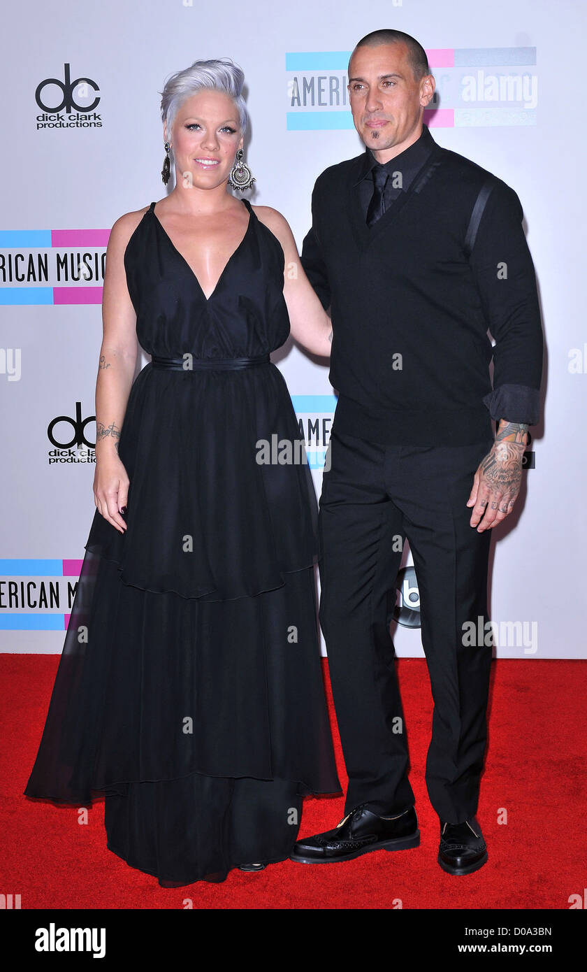Singer Pink, real name Alecia Moore and husband Carey Hart 2010 ...