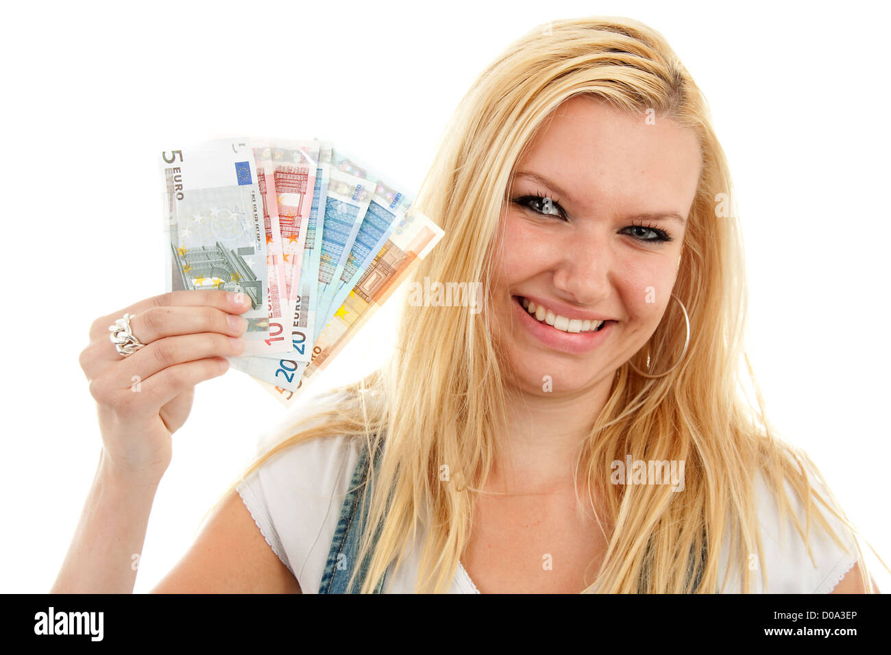 Young woman is holding euro money isolated on white background Stock ...