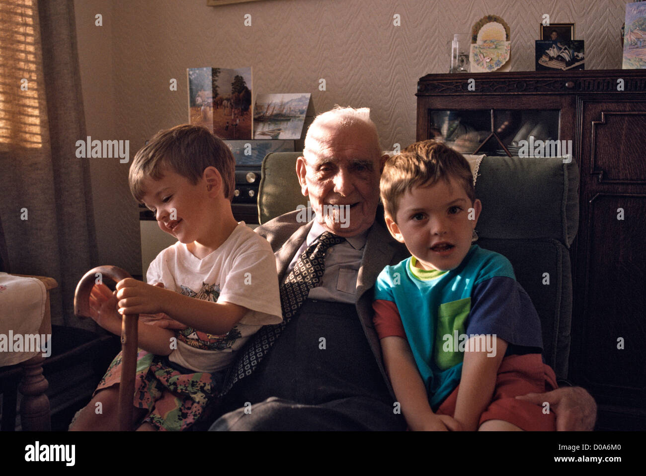 great grandfather with to great grandchildren Stock Photo - Alamy