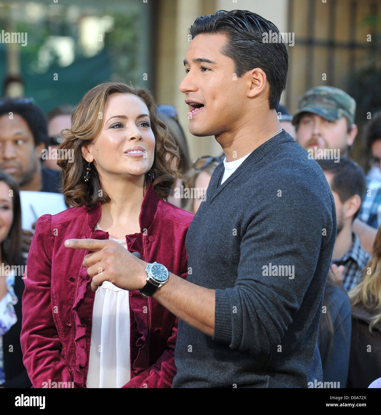 Alyssa Milano and Mario Lopez arrive for the Extra TV show interview at ...