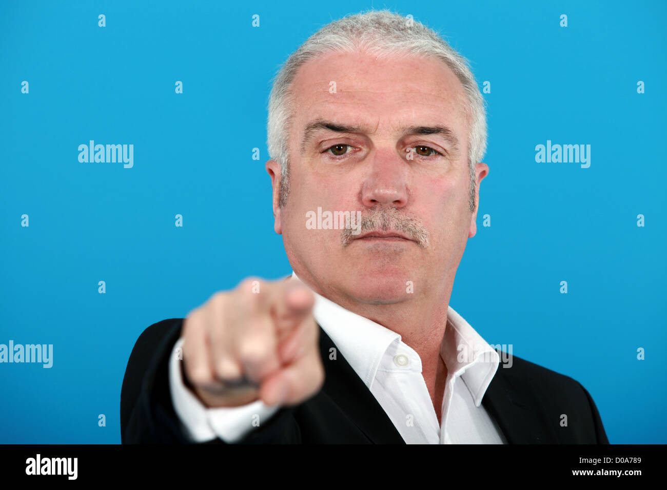 A boss blaming one of his employee Stock Photo - Alamy