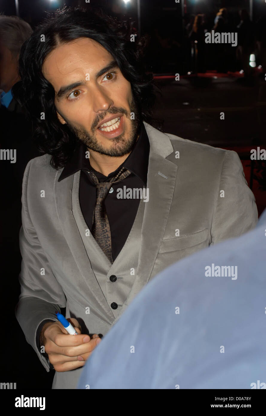 Russell Brand signs autographs for fans at the premiere of 'The Tempest ...