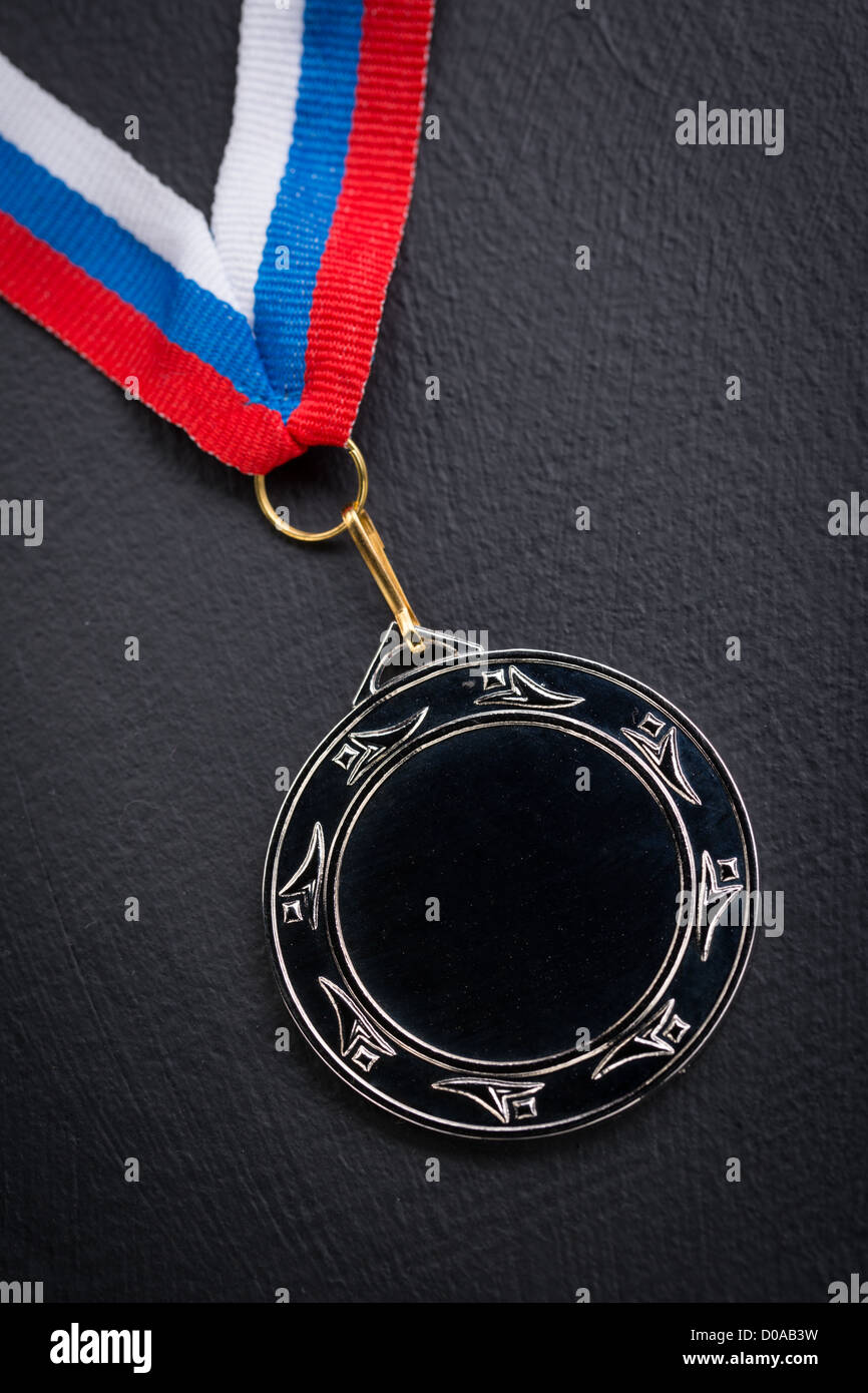 Metal medal with tricolor ribbon Stock Photo - Alamy