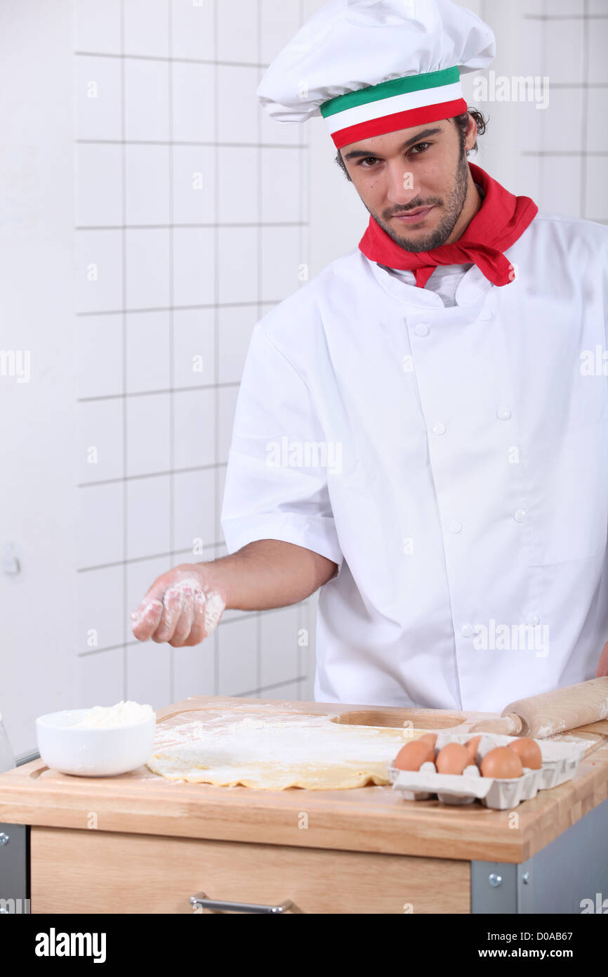 pizzaiolo preparing pizza Stock Photo - Alamy