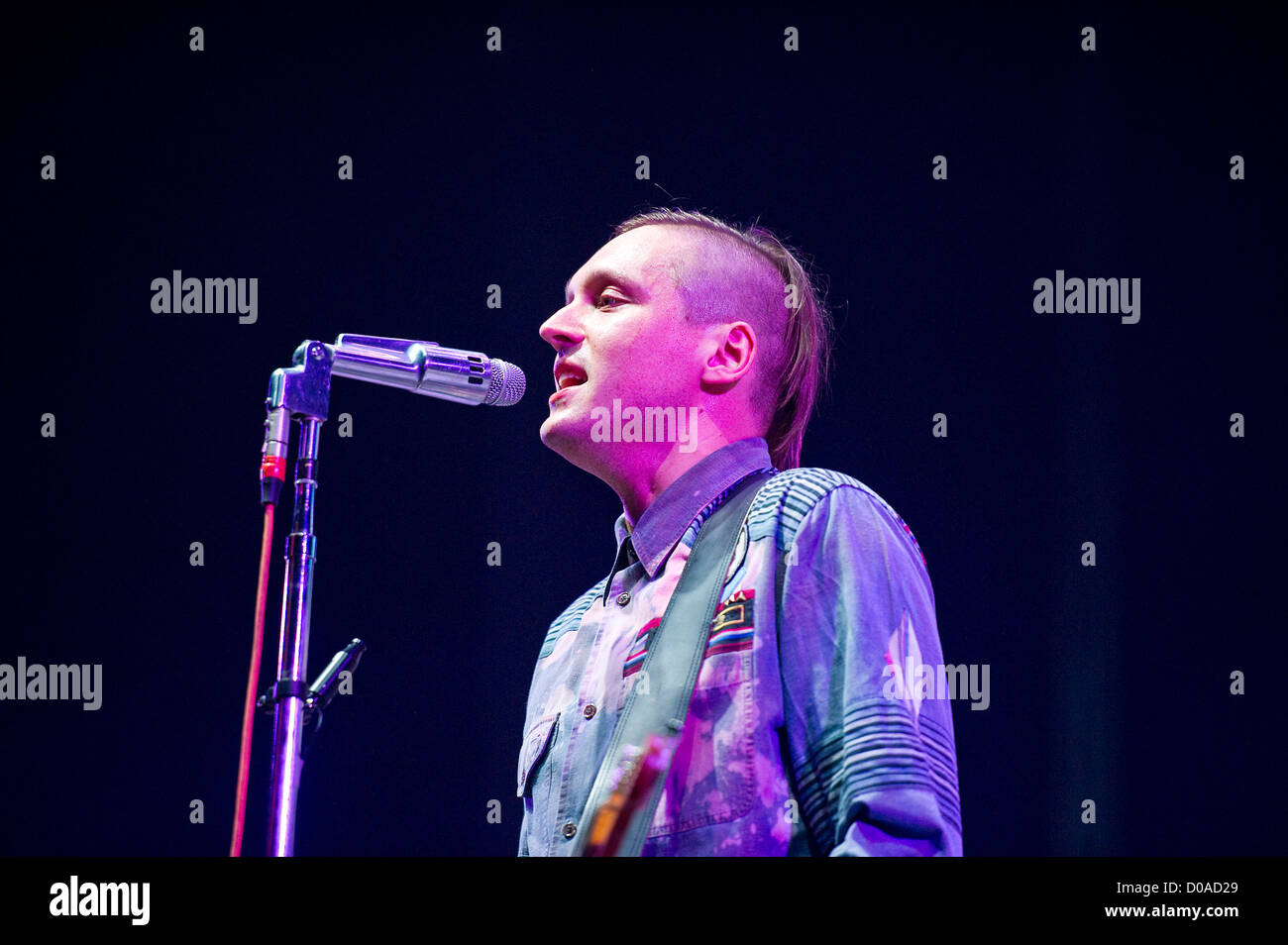 Win Butler of Arcade Fire performs live on stage at O2 Arena London ...