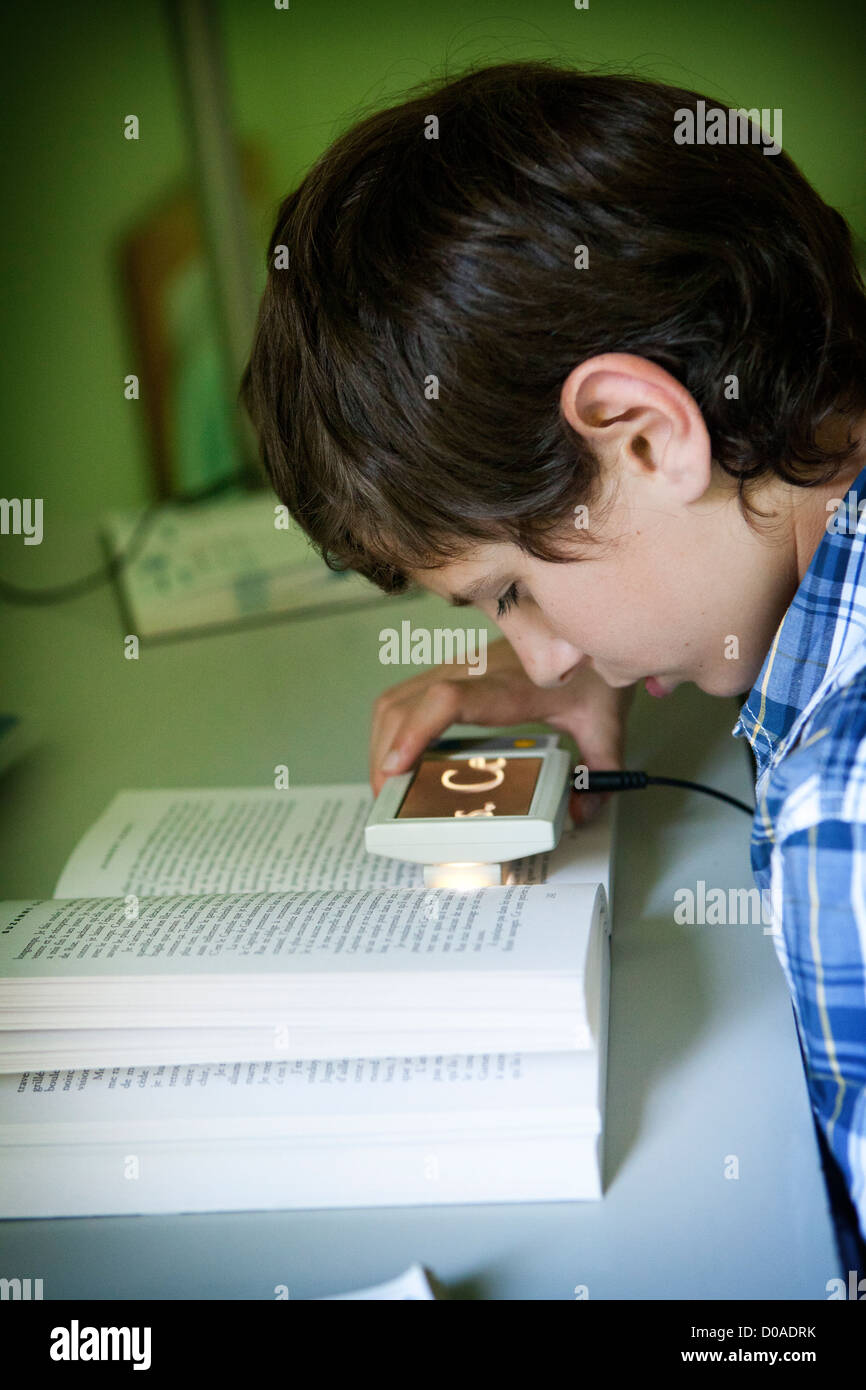 Visually impaired magnifier hi-res stock photography and images - Alamy