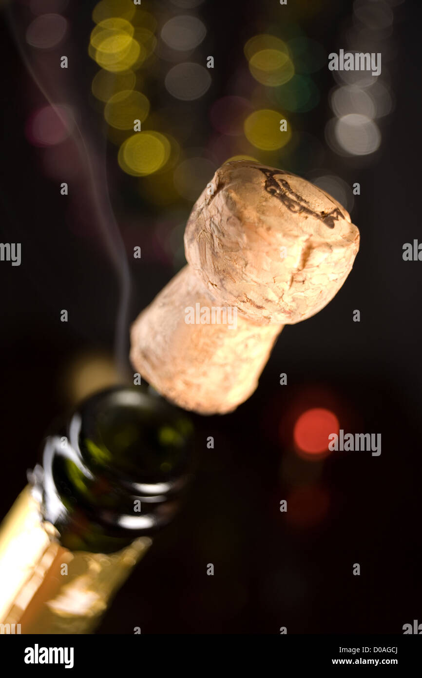 Champagne bottle exploding Stock Photo - Alamy