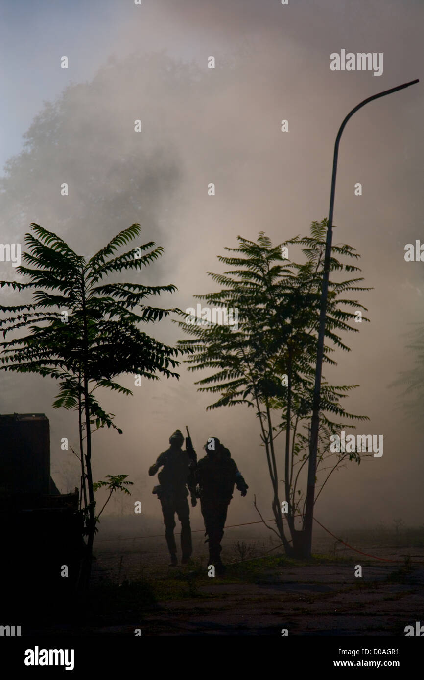 Battlefield with two soldiers Stock Photo - Alamy