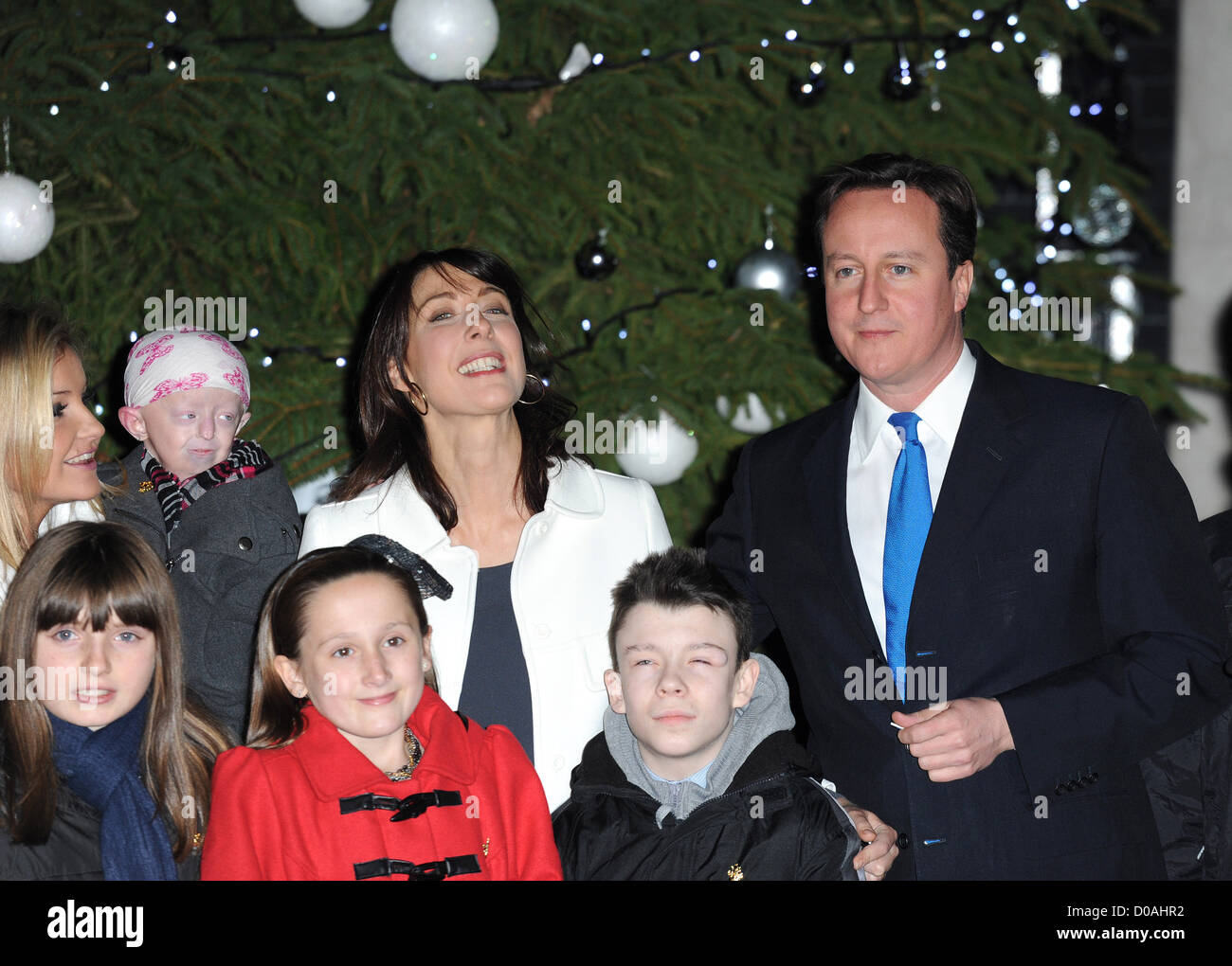 Prime Minister David Cameron and wife Samantha Cameron turn the ...