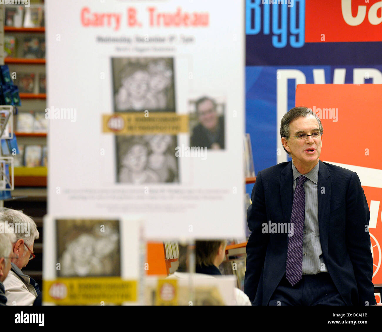 Garry B.Trudeau signs the new essential anthology for one of the ...