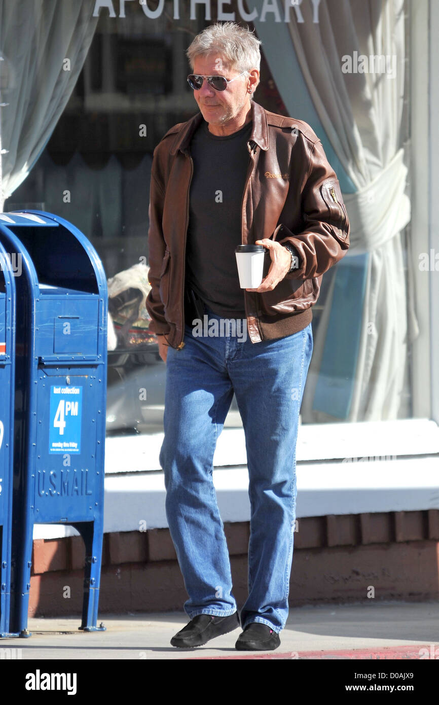 Harrison Ford in a brown leather flying jacket and jeans gets a coffee ...