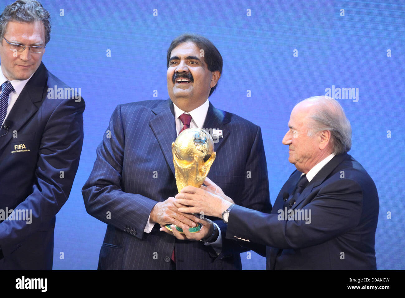 Sheikh Hamad bin Khalifa Al-Thani, Emir of Qatar, holds the World Cup ...