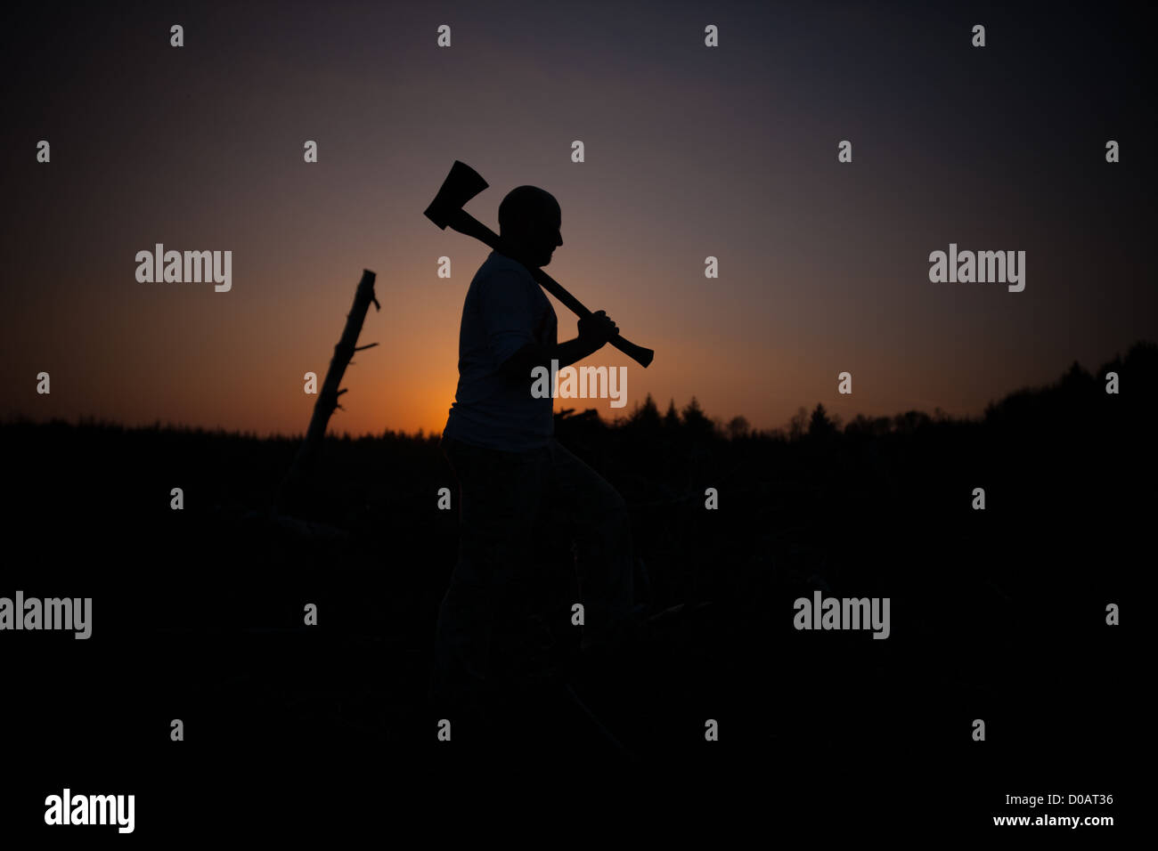 Wielding the axe hi-res stock photography and images - Alamy