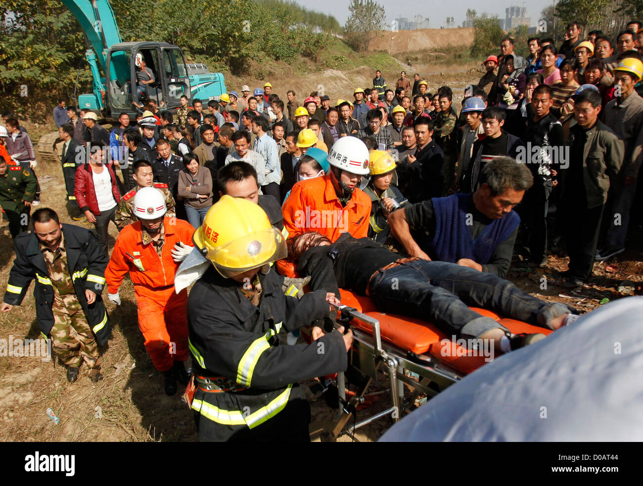 HUGE EXCAVATOR FLIPS LANDS ON LADY A brave woman had to dig deep to ...