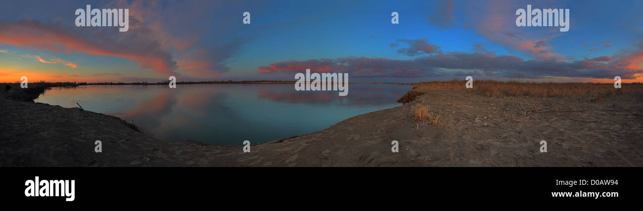Sunset panorama on the river Stock Photo - Alamy