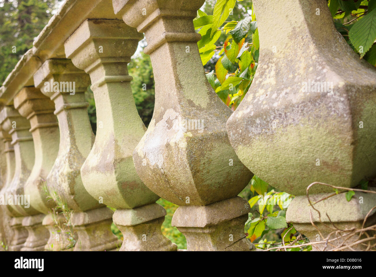 Ornate stone pillars on a bridge at Howick Gardens in Northumberland ...