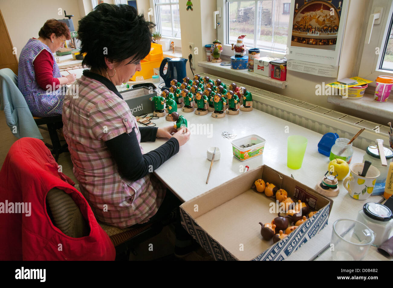 Christmas ornaments being manufactured in workshop of Muller GmbH ...