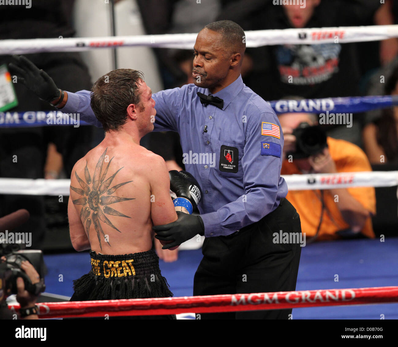 Michael Katsidis with referee Kenny Bayless Ring Magazine's WBA & WBO ...