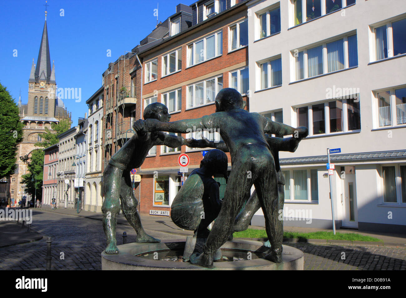 Bronze sculpture of children playing hi-res stock photography and ...