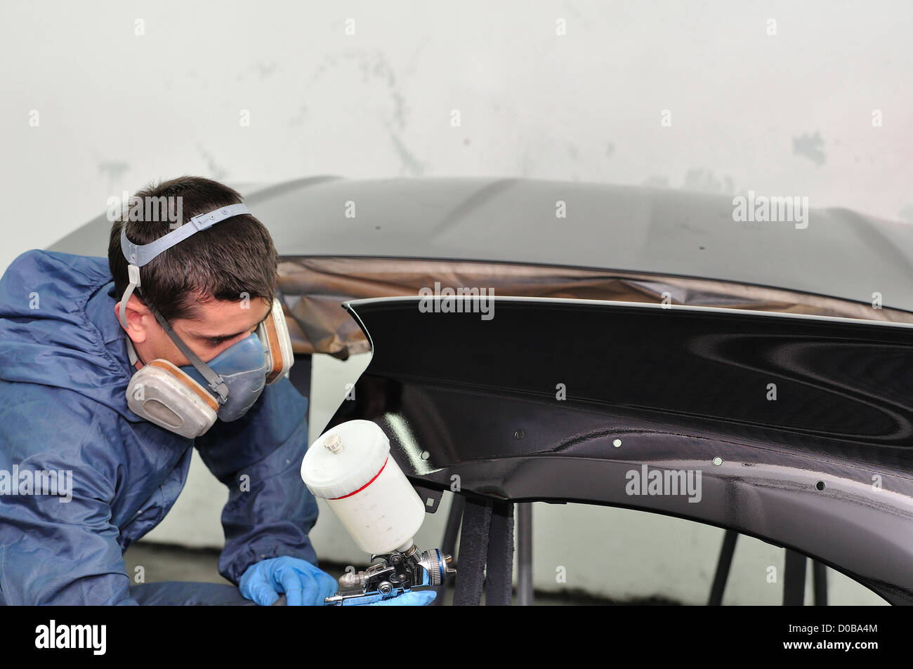Painter at work Stock Photo - Alamy