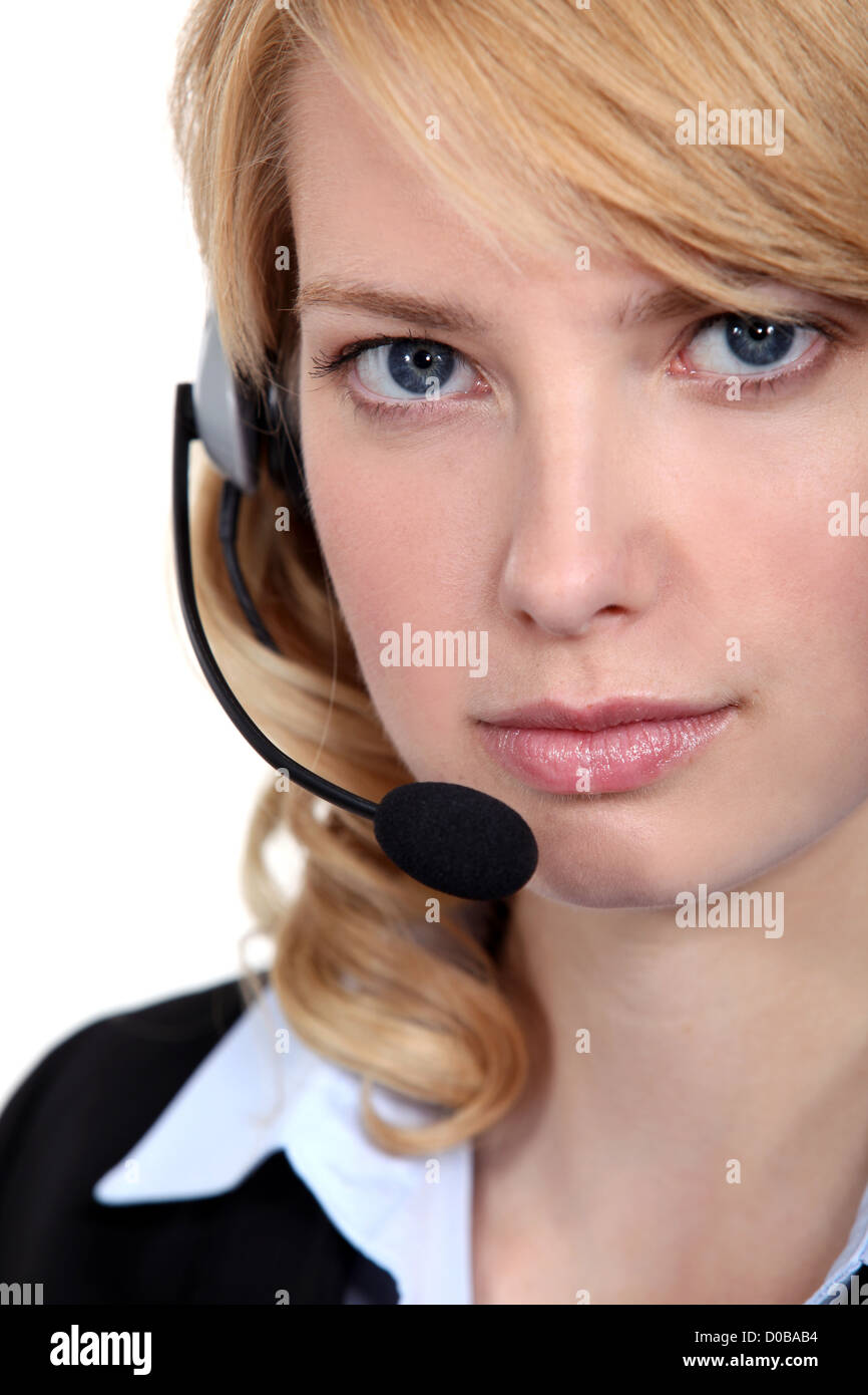 young blonde receptionist on the phone Stock Photo - Alamy