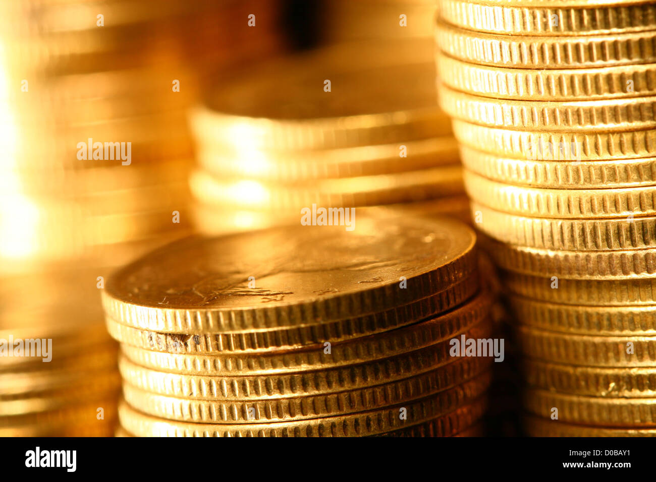 golden piles of coins macro background Stock Photo - Alamy