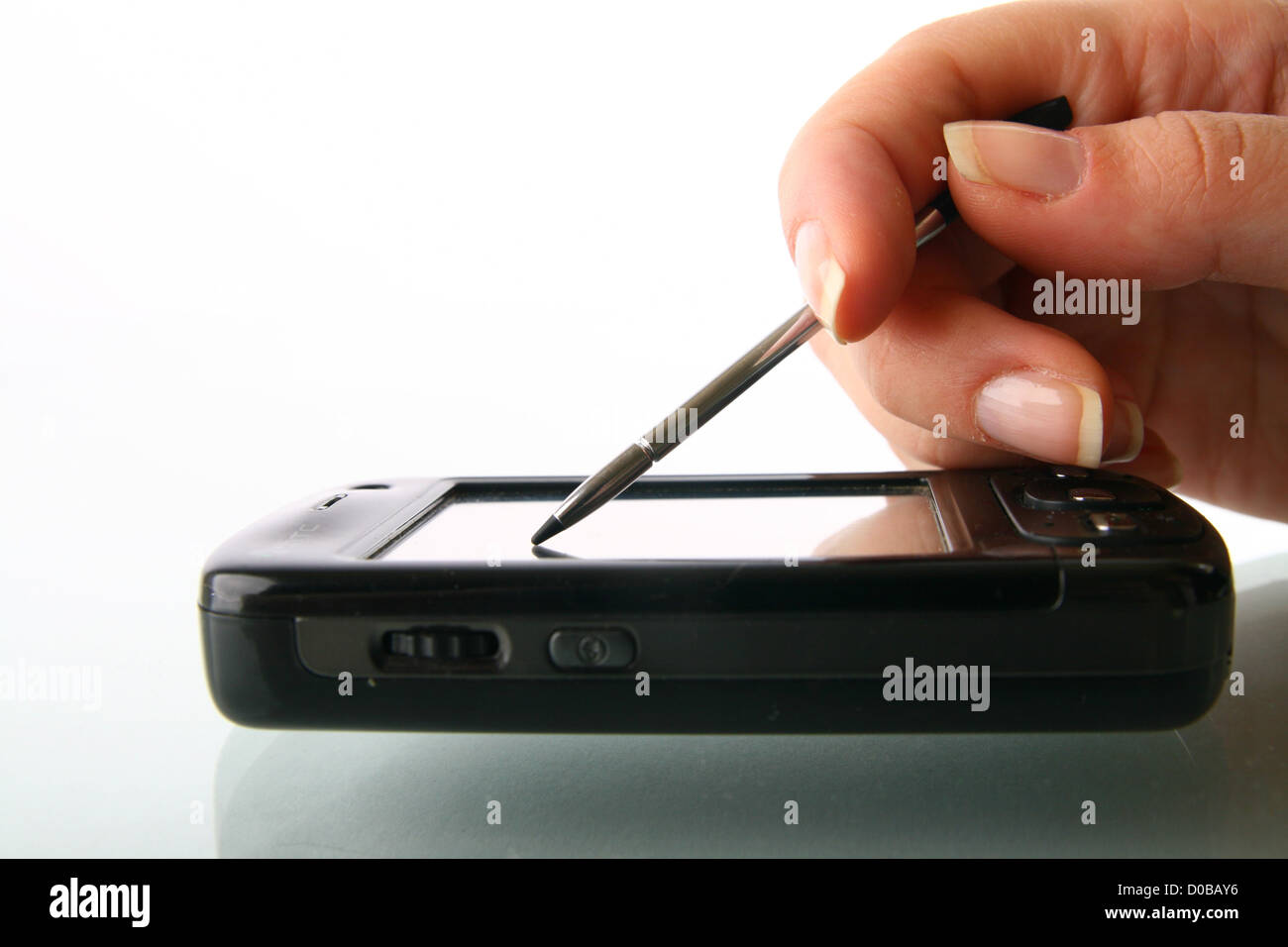 girl hand work on communicator Stock Photo - Alamy