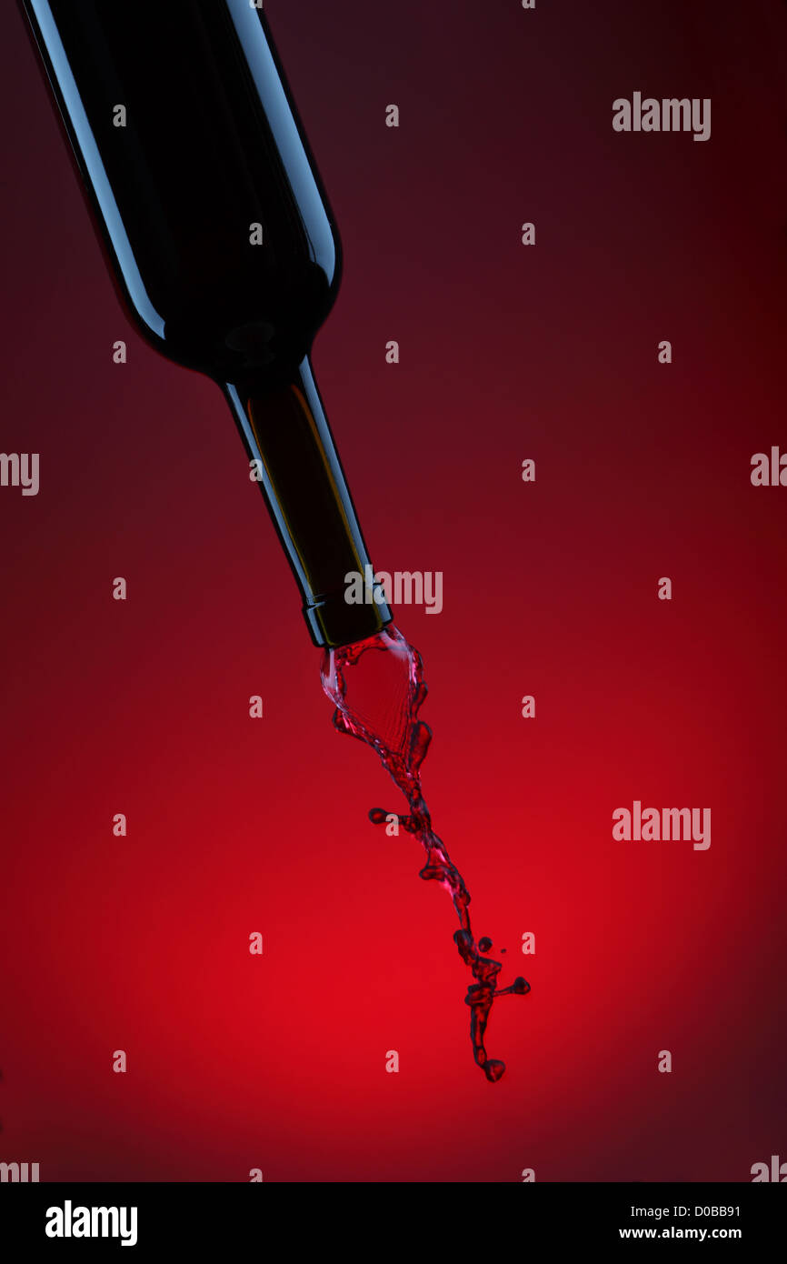 Flowing wine from a bottle Stock Photo - Alamy