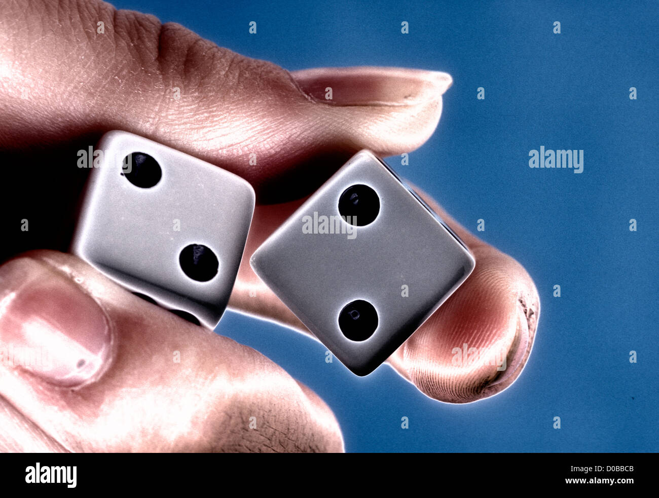 Hand holding pair dice hi-res stock photography and images - Alamy
