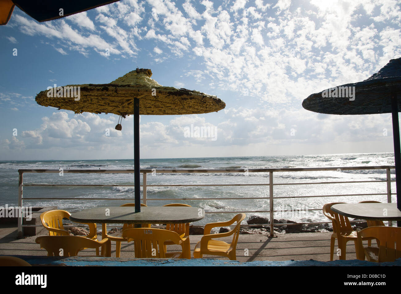 Beach cafe and empty tables overlook the Mediterranean Cyprus Stock ...