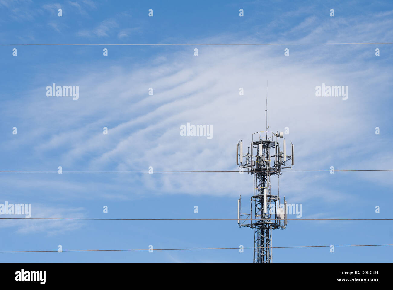 radio transmitter with antenna on blue sky Stock Photo - Alamy