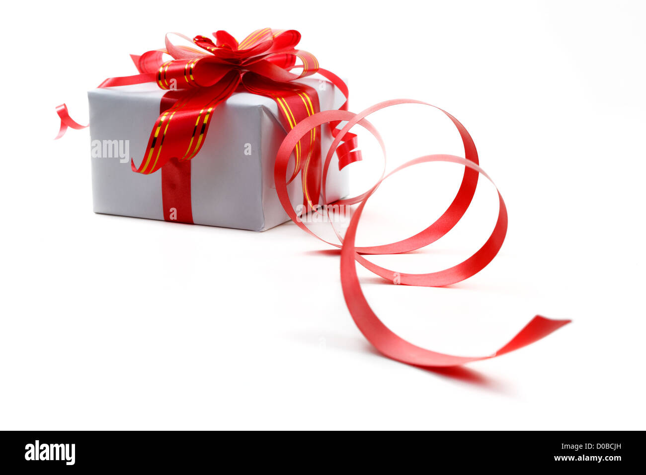 gift box with red bow isolated on white Stock Photo - Alamy