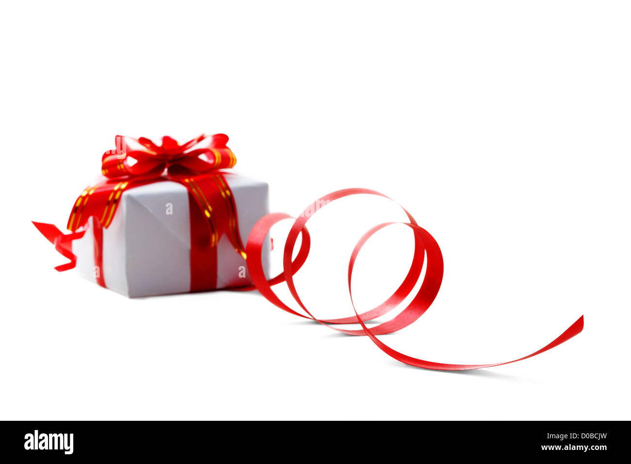 gift box with red bow isolated on white Stock Photo - Alamy