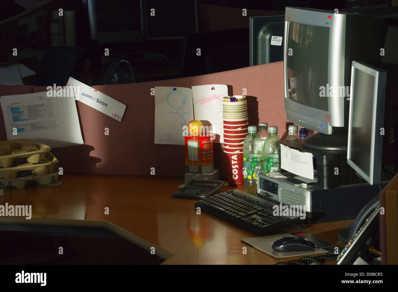 An empty workstation at dawn before a busy day in the office begins ...