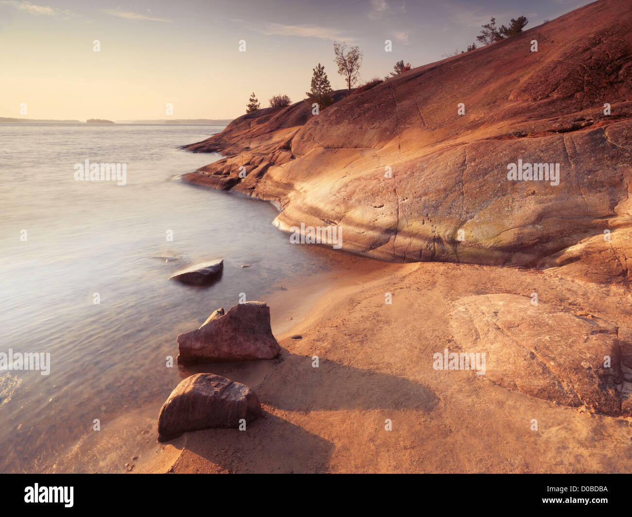 Beautiful landscape nature scenery of Georgian Bay red rocky shore at ...