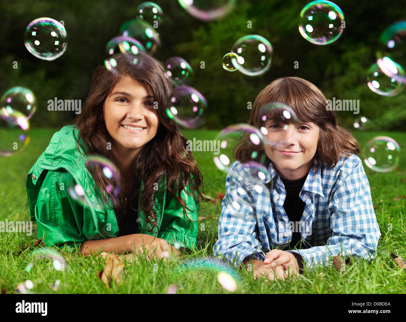 Bubbles surrounding people hi-res stock photography and images - Alamy
