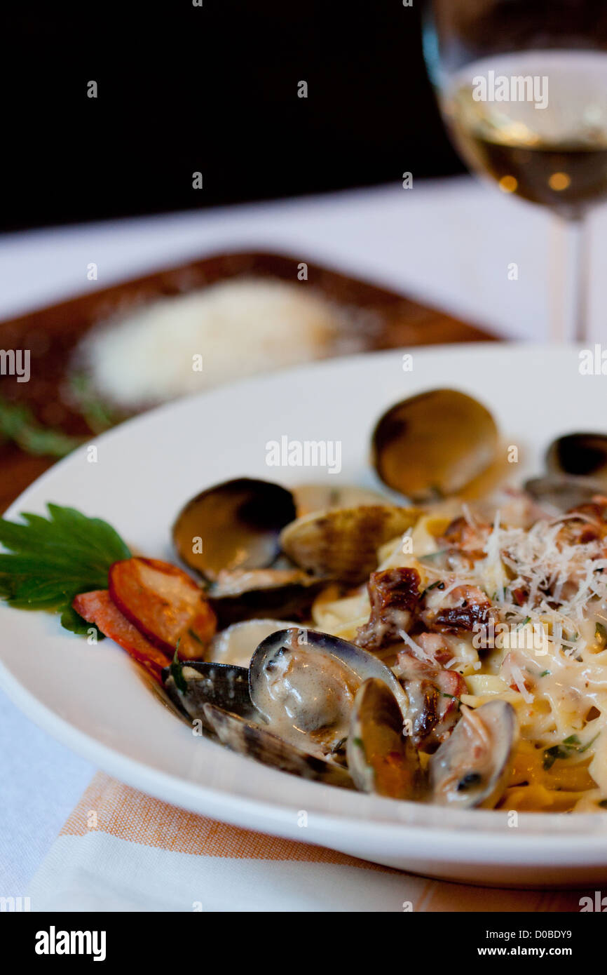 Clam linguine with freshly grated parmesan cheese Stock Photo - Alamy