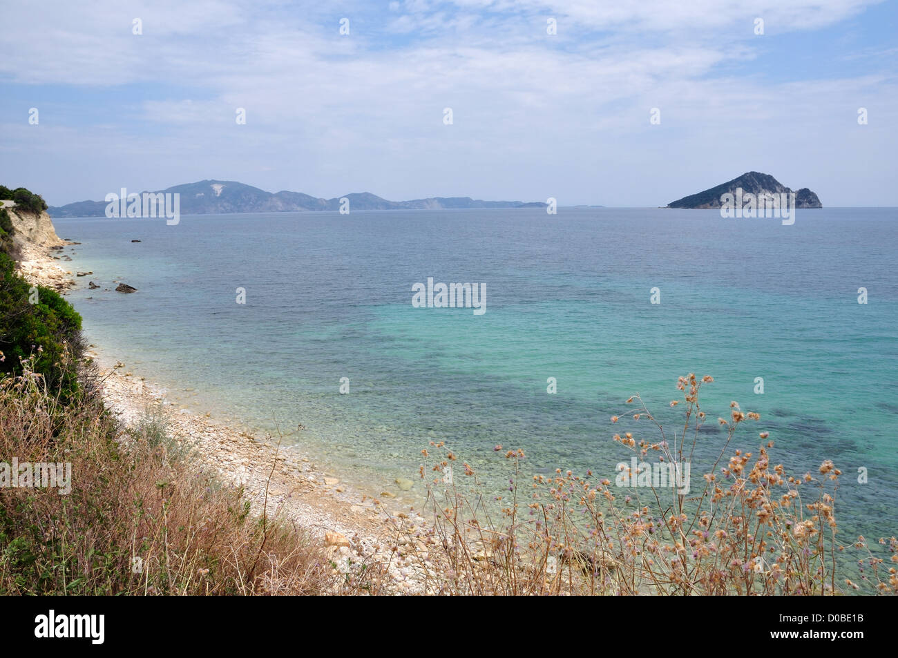 Empty eroded stone beach in Laganas bay Zakynthos, Greece. Distant view ...