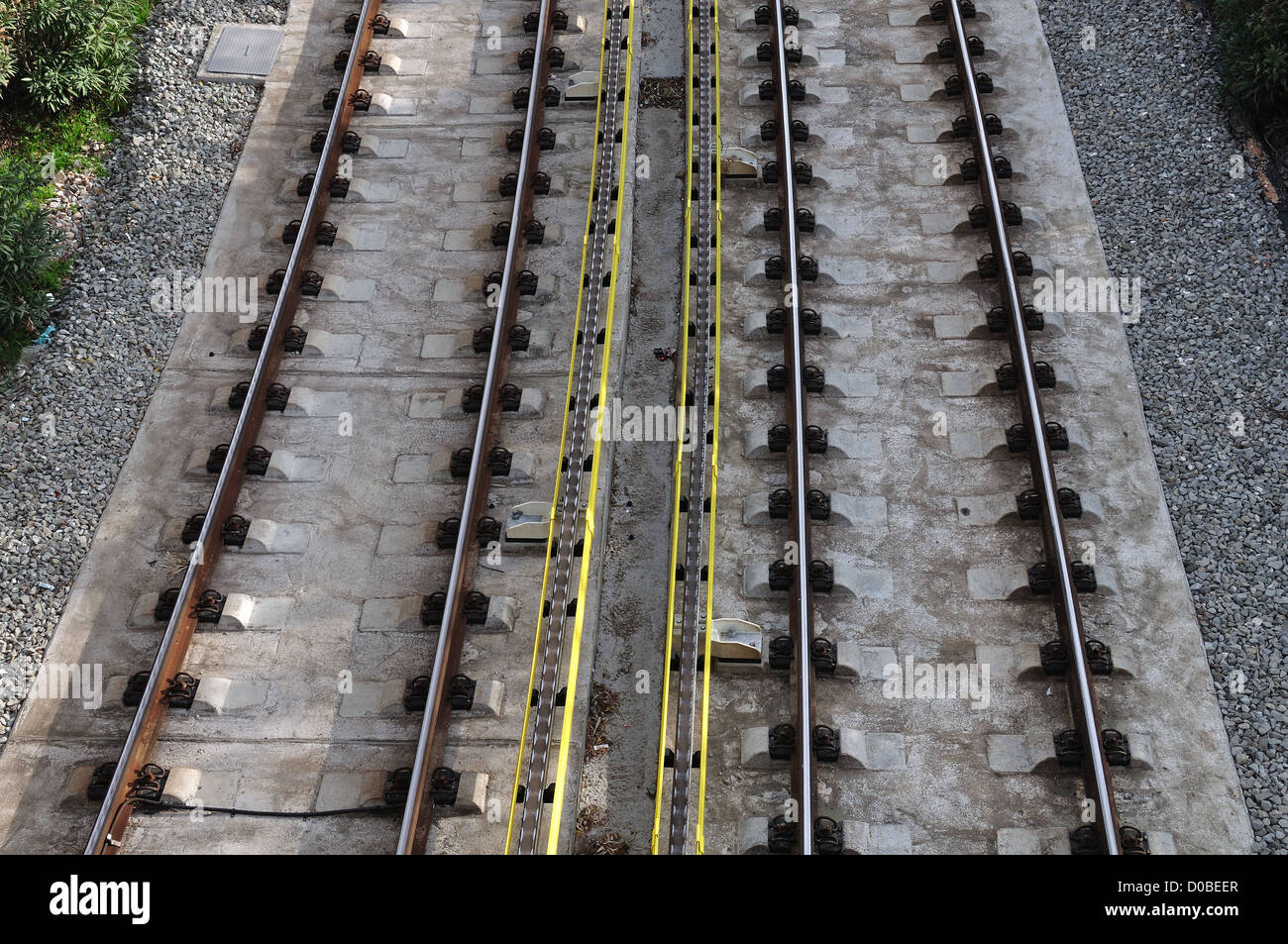 Concrete paved metal tracks of urban electric railway Stock Photo - Alamy