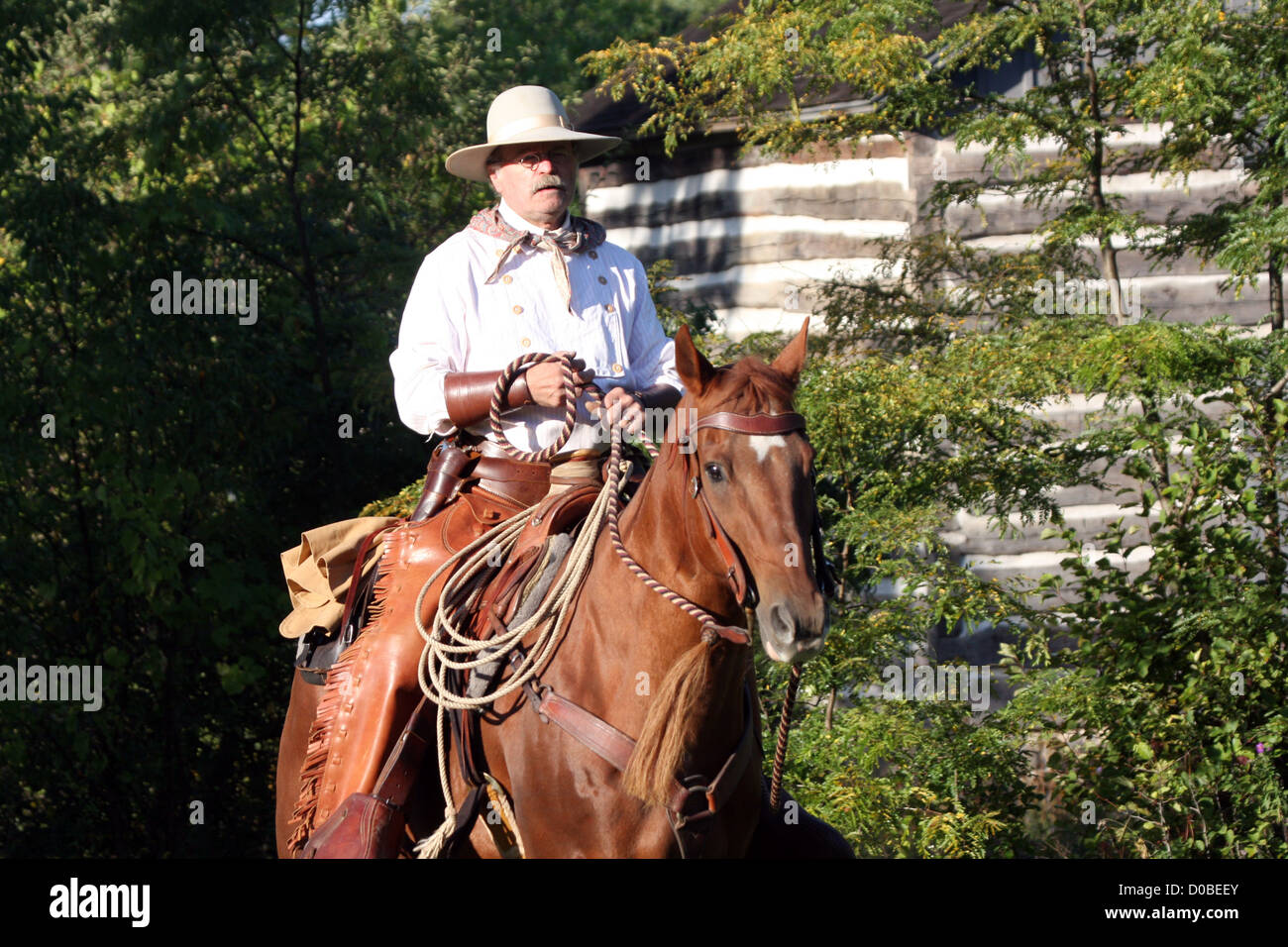 Man Riding Horse Past Western Stock Photos & Man Riding Horse Past ...