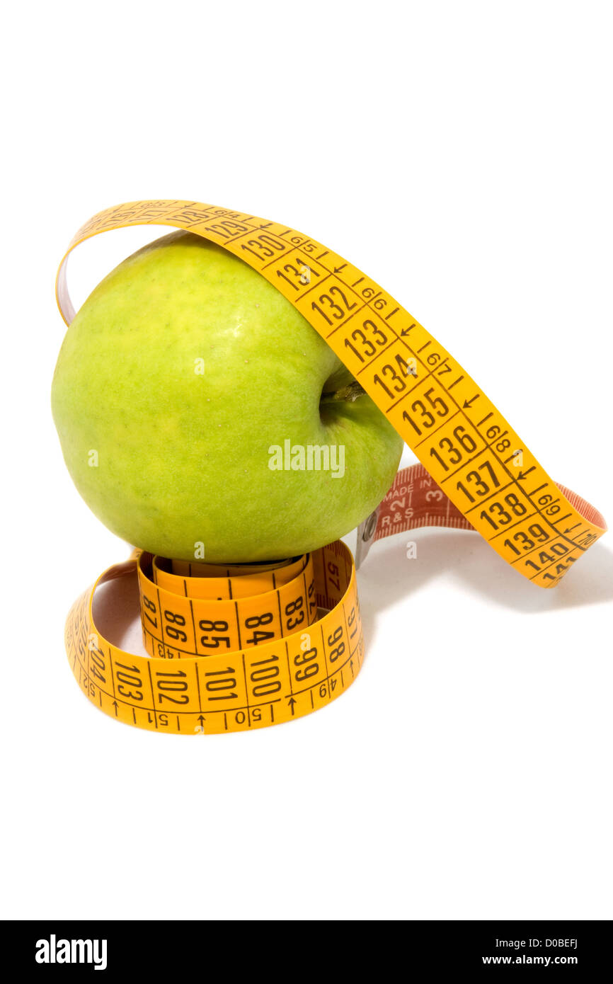Apple with measure tape isolated on white background Stock Photo - Alamy
