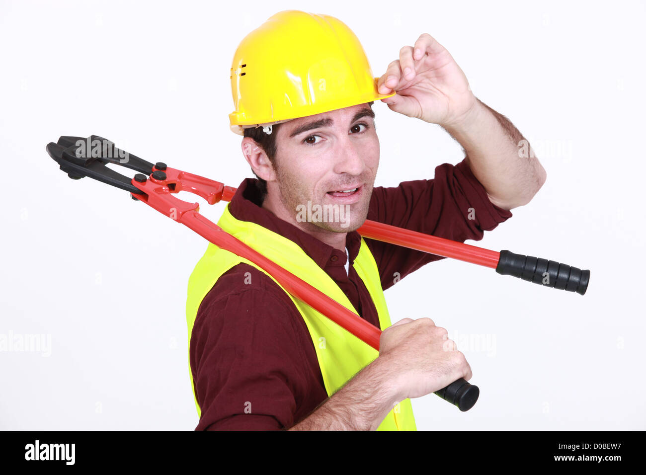 Construction worker with boltcutters Stock Photo - Alamy