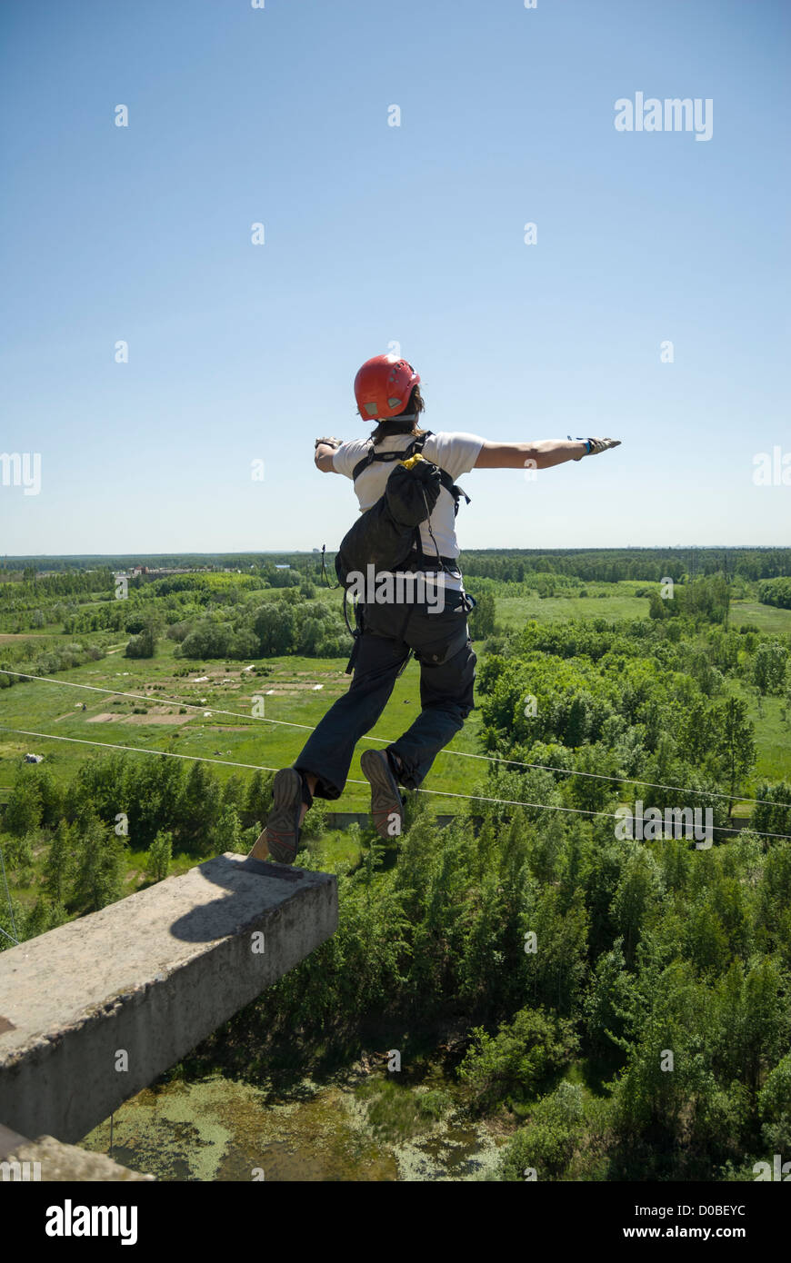 ropejumper standing jumping edge building tall extreme sports risk rope ...