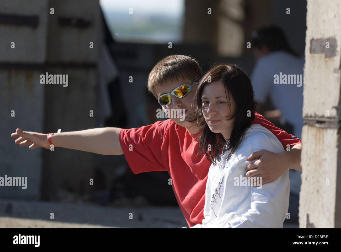 young couple hug embrace together Stock Photo - Alamy